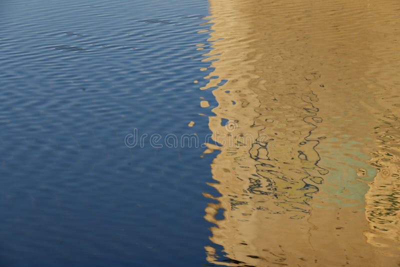 An Image of Reflections on the Surface of the Water. Stock Photo ...