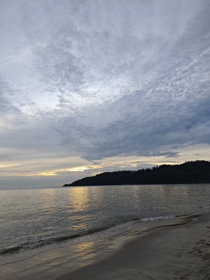 Relaxing by the Beach while Relaxing and Looking Up the Blue Evening ...