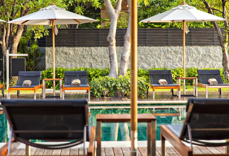 Pool loungers stock image. Image of lounge, chair, house - 29807721