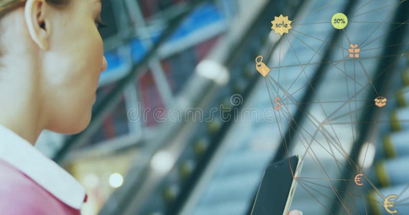 Image of Retail Network Over Caucasian Businesswoman Using Smartphone on Escalator Stock Photo ...