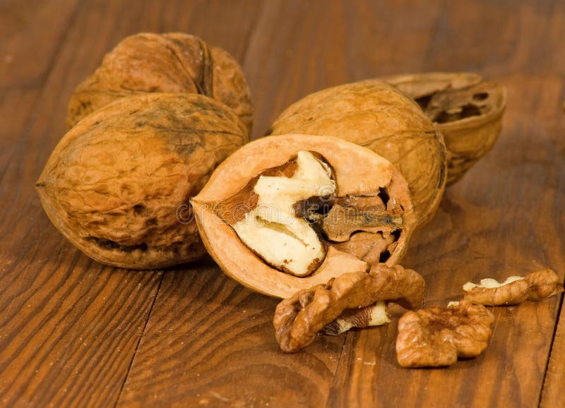 Image of Ripe Walnuts on the Table Close-up Stock Image - Image of ...