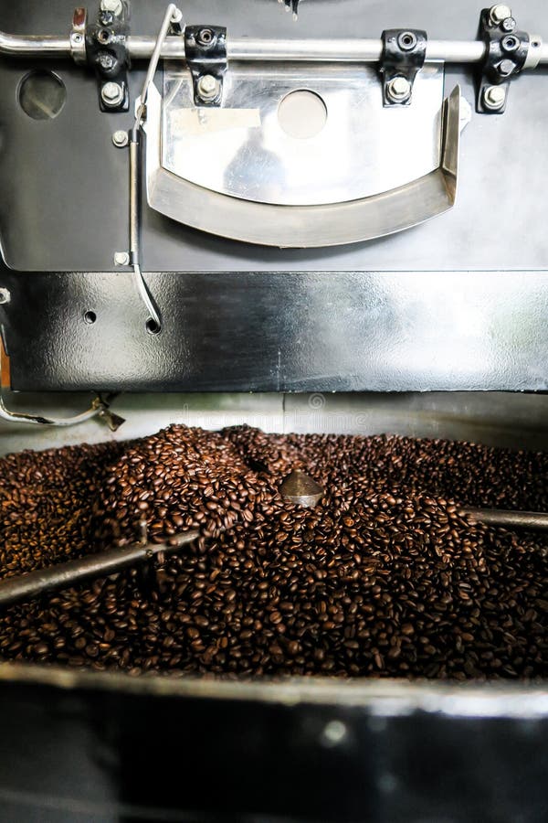 Roasting process of coffee stock photo. Image of machine - 250093356