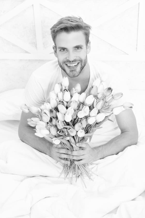 Image of Romantic Man with March Tulips Bouquet. Romantic Man with ...