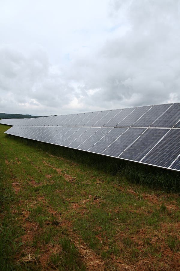Solar panels in a field stock photo. Image of blue, home - 132188810