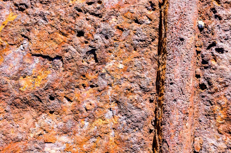 The Image is of a Rusty Rock with a Crack in it Stock Photo - Image of ...
