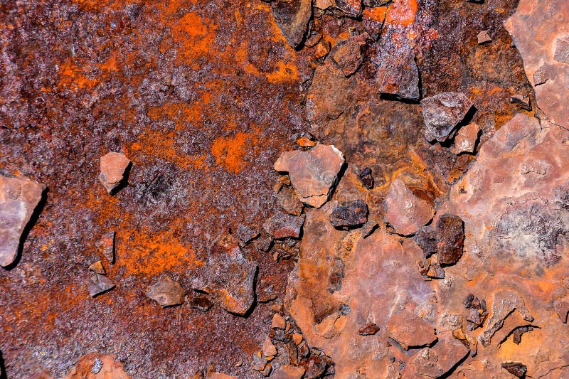 The Image is of a Rusty Surface with a Lot of Debris and Rocks Stock ...