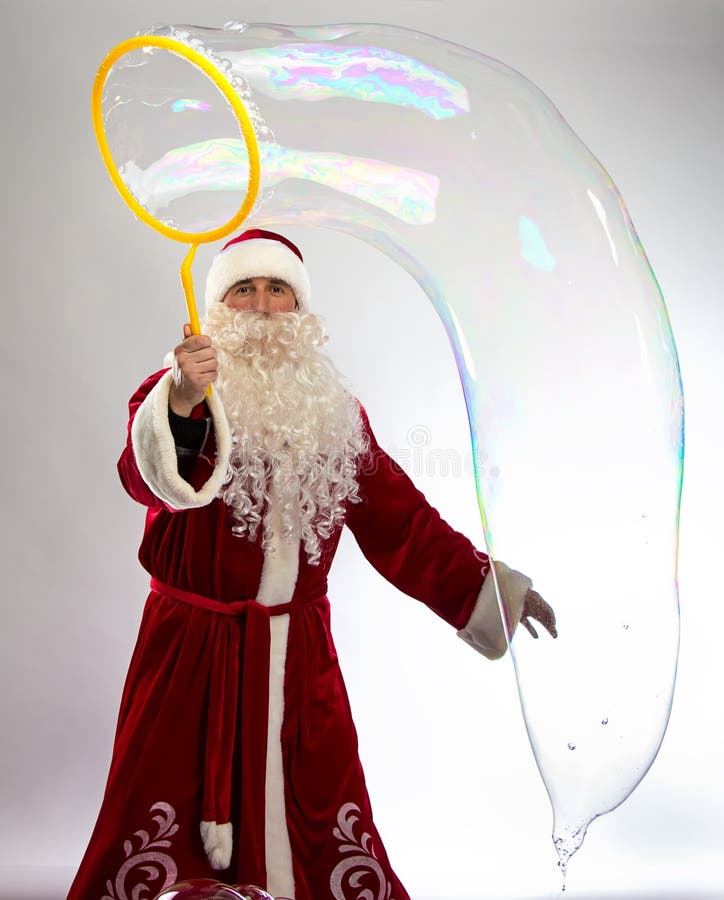 Image of Santa Looking at Bubble Stock Image - Image of cold, blue ...