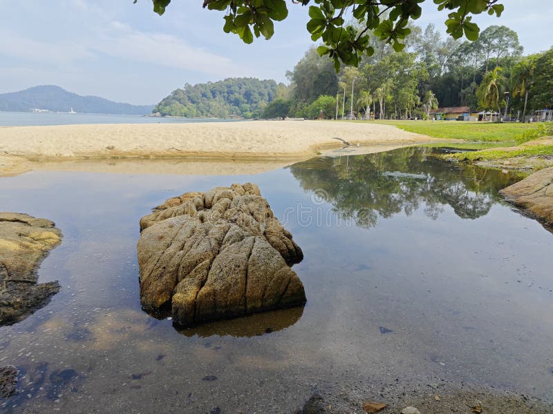 Scene of Boulder Laying Along the Sandy Beach Stock Image - Image of ...