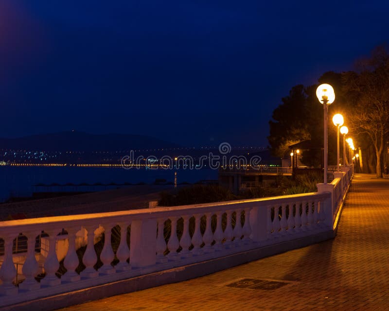Seafront at night stock photo. Image of evening, front - 252215050