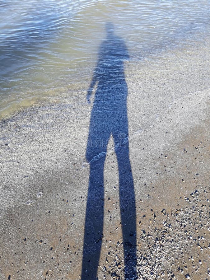 Selfie Shadow on Beach stock photo. Image of sand, surf - 158530484