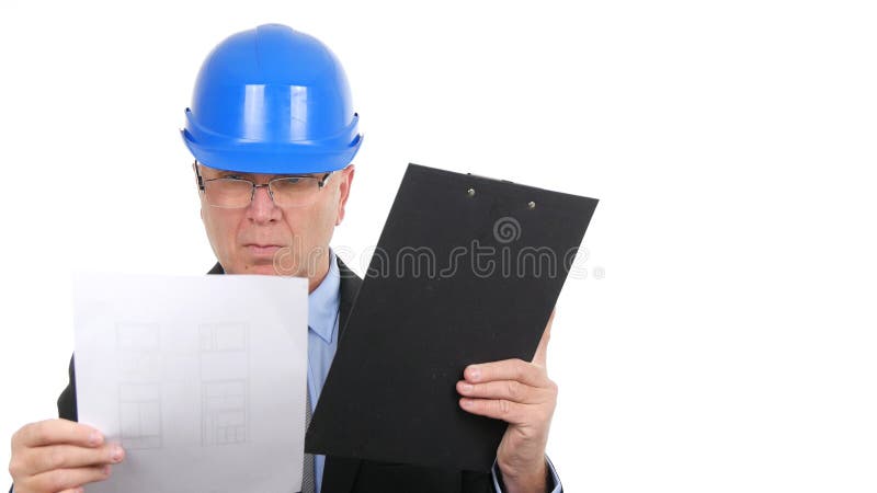 Image with a Serious Engineer Reading Technical Plans Stock Image ...