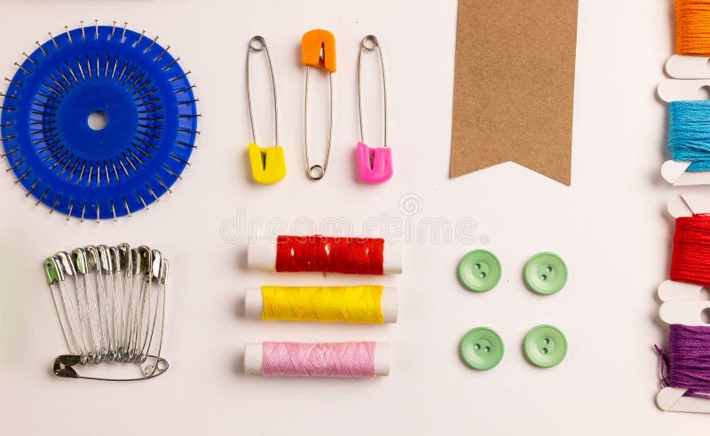 Image of Sewing Materials with Scissors, Buttons and Threads on Cream ...