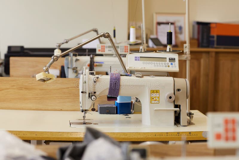 People sewing in workshop stock image. Image of equipment - 161244471