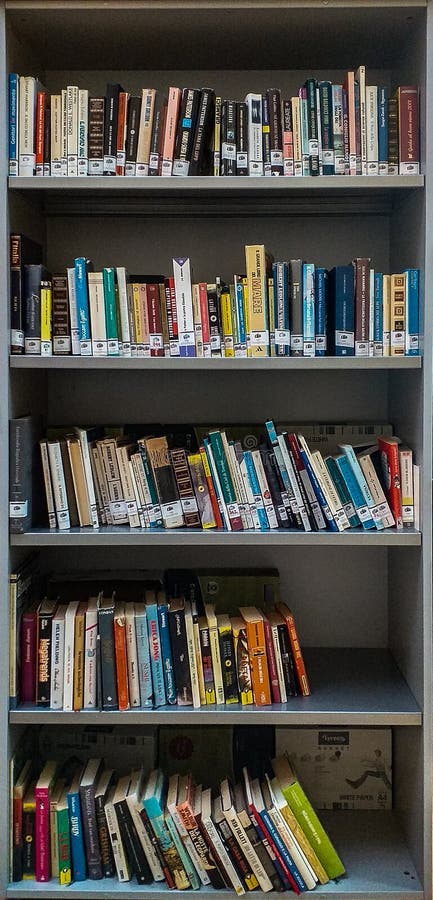 Image of Shelf Used As a Small Bookcase with Various Books Put in Order ...