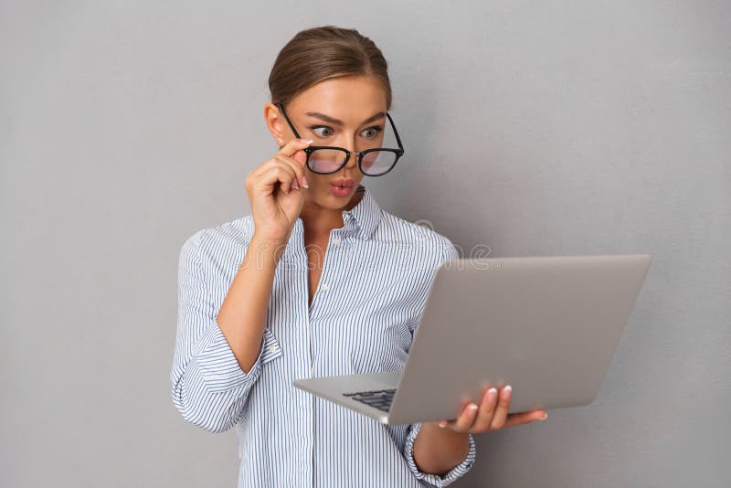 Shocked Business Young Woman Posing Isolated Over Grey Wall Background ...