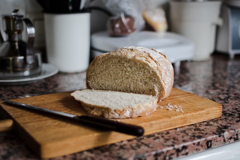 Loaf of Bread in the Kitchen Stock Photo - Image of baker, cook: 132159096