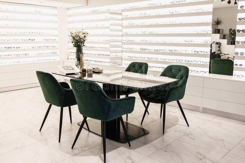 Modern Optical Store Interior with Eyeglasses Display and Seating Area ...