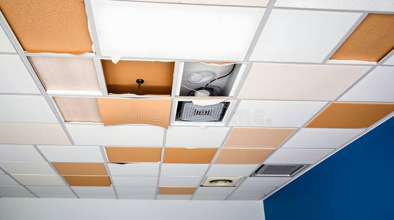 Damaged Suspended Ceiling with Exposed Wiring and Fixture Stock ...