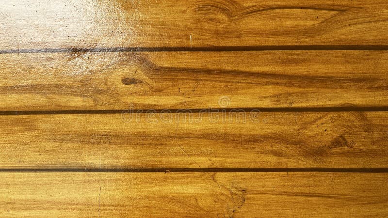 This Image Showcases a Wooden Surface with a Rich Natural Grain Pattern ...