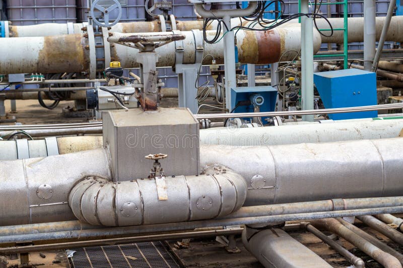 Industrial Complex Piping System with Valves and Insulation in a ...