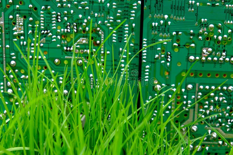 An Image Showing a Green Circuit Board with Numerous Small Components ...