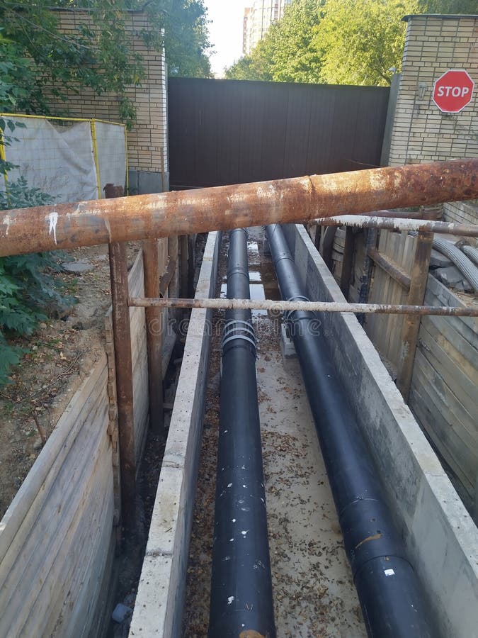 Underground Utility Installation: Active Construction Site with Large ...