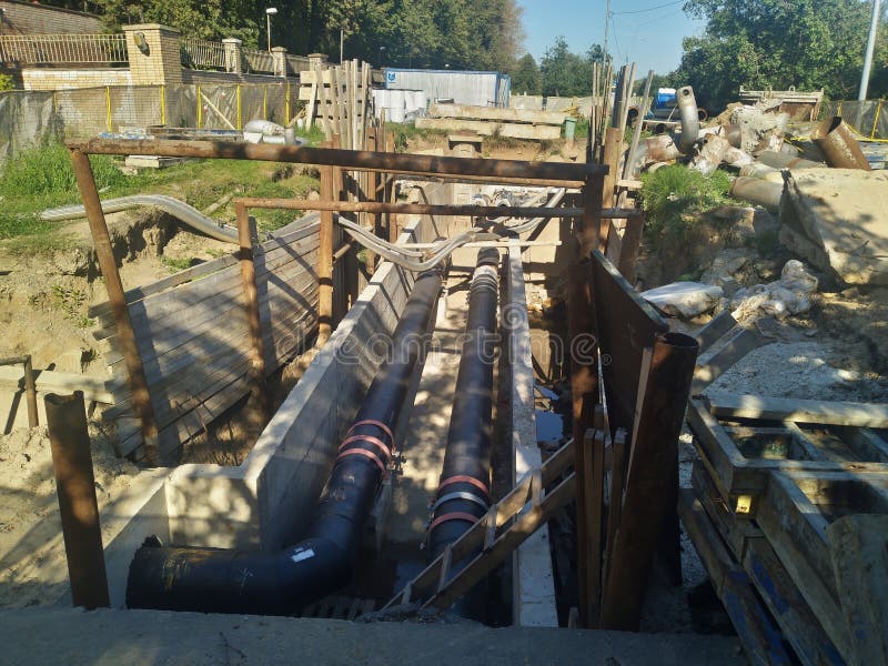 Underground Utility Installation: Active Construction Site with Large ...