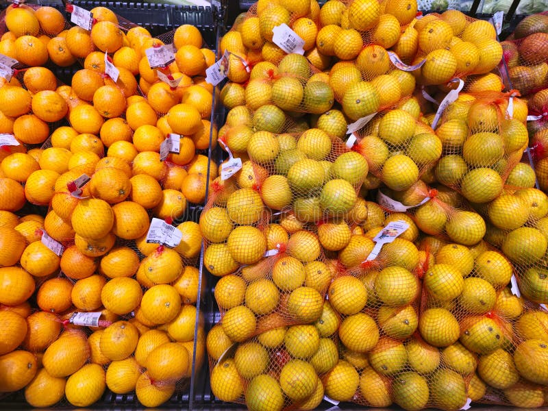 Bagged Oranges in Nets at the Supermarket Fruit Section Stock Image ...