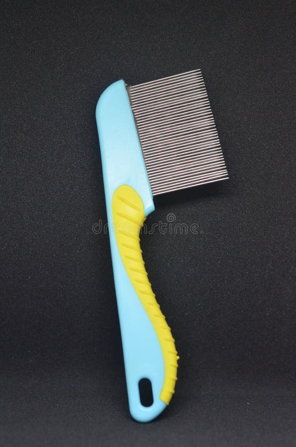 Blue and Yellow Nit Comb on Black Background Stock Image - Image of ...