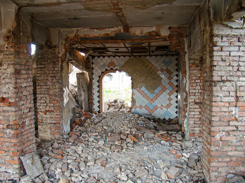 Image Shows a Damaged Interior Structure with Debris, Exposed Beams ...