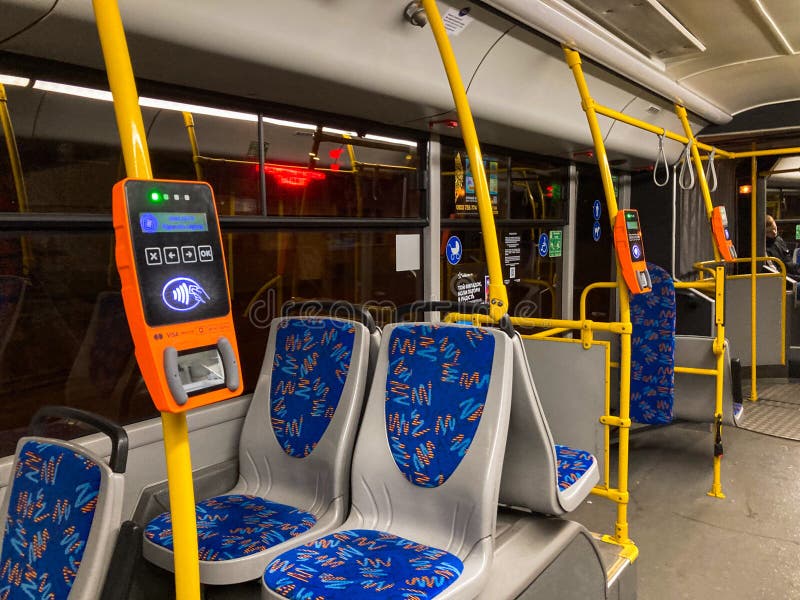 The Image Shows an Empty, Modern Bus Interior with Blue and Orange Seat ...