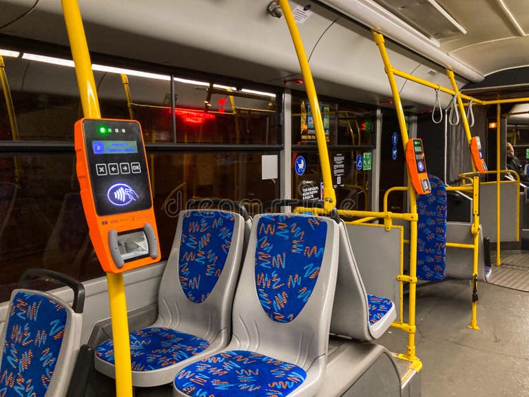 The Image Shows an Empty, Modern Bus Interior with Blue and Orange Seat ...