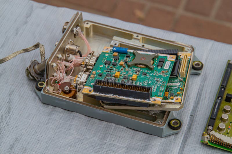Image Shows an Exposed Electronic Device with Internal Components Like ...
