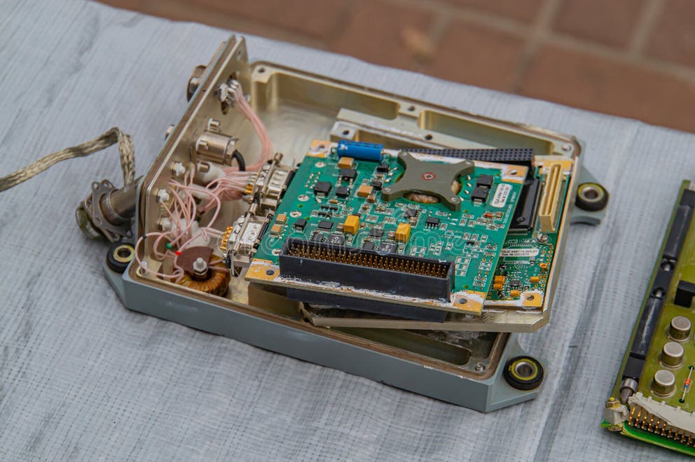 Image Shows an Exposed Electronic Device with Internal Components Like ...