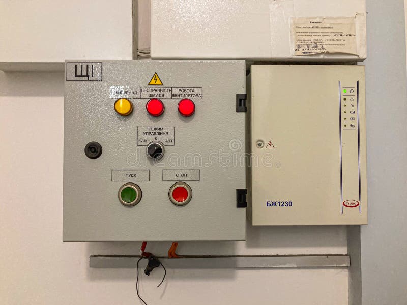 Image Shows a Grey and Red Industrial Control Panel with Emergency Stop ...