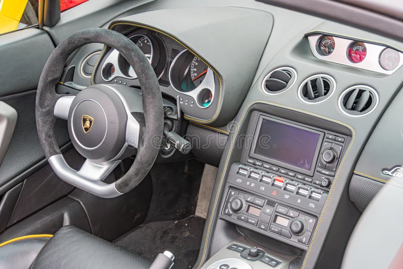 Image Shows the Interior of a Luxury Vehicle, Focusing on the Drivers ...