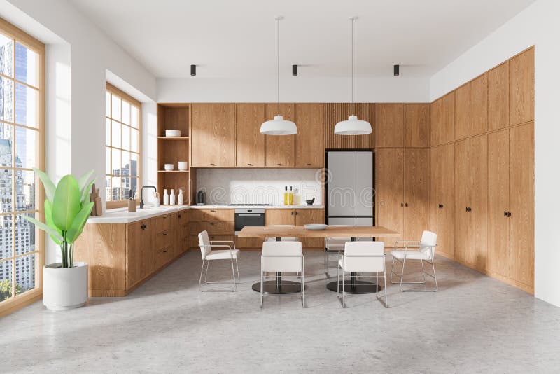 The Image Shows a Modern Kitchen Interior with Wooden Cabinets, a ...