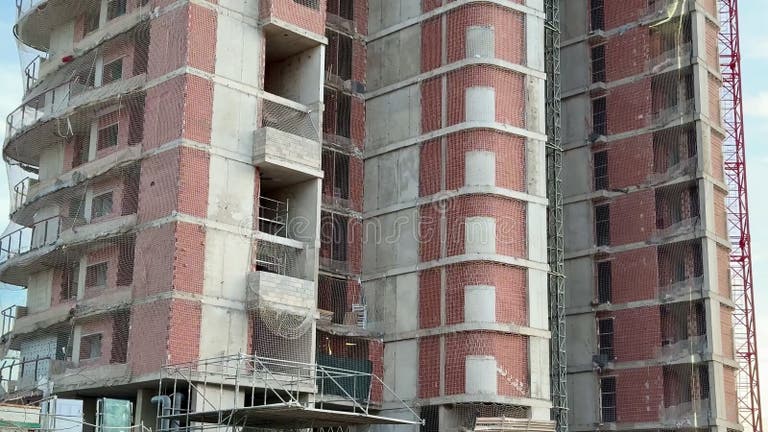 A Modern Highrise Building is Under Construction in the Busy City ...