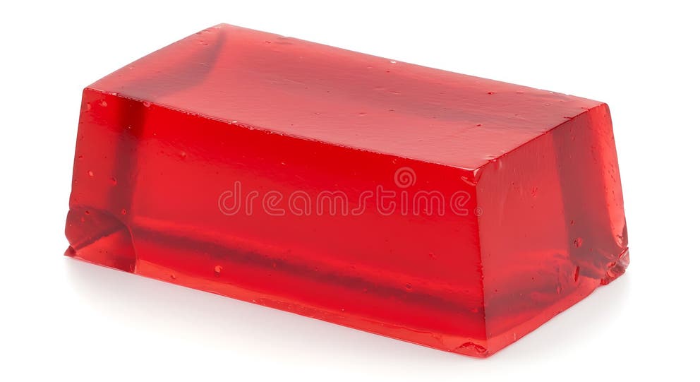 A Rectangular Block of Red Gelatin Dessert Against a White Background ...