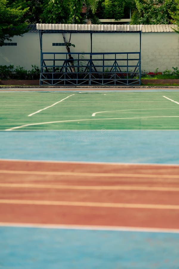 A Sports Area with Multiple Colored Surfaces, Covered Seating Area with ...