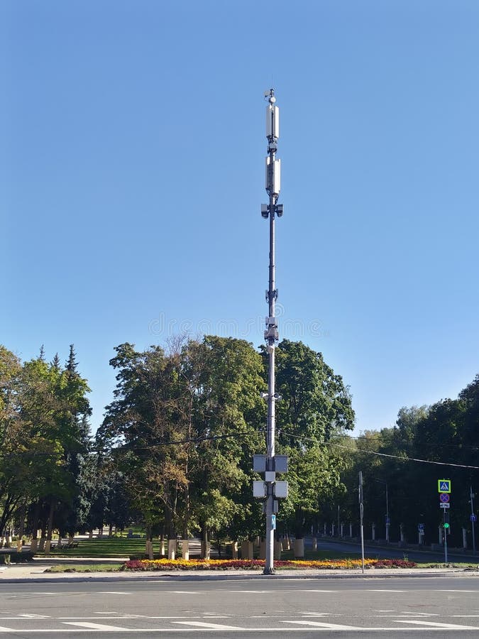 Urban Surveillance and Communication Tower in a City Intersection with ...