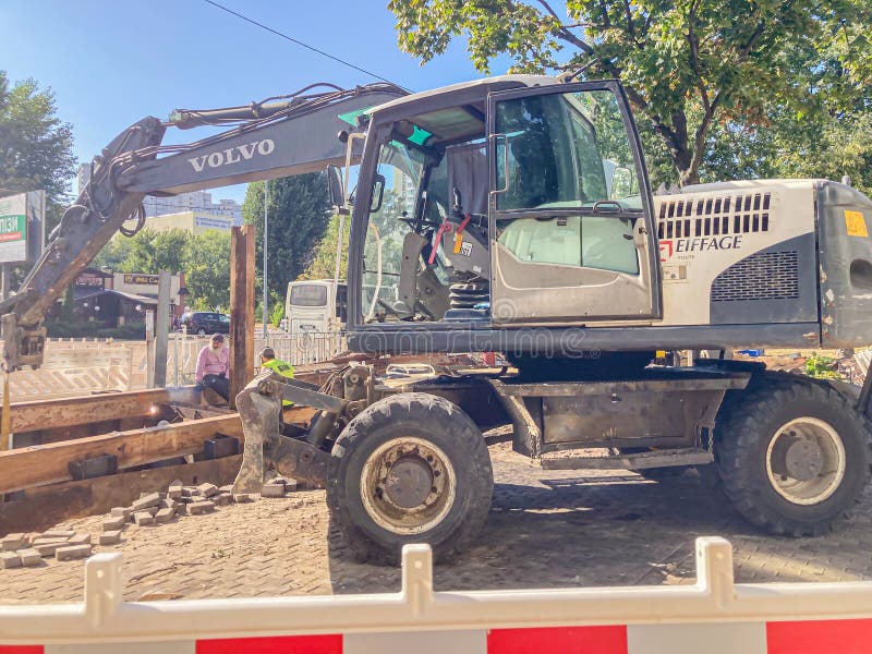 Image Shows a Volvo Compact Track Loader at a Construction Site, with ...