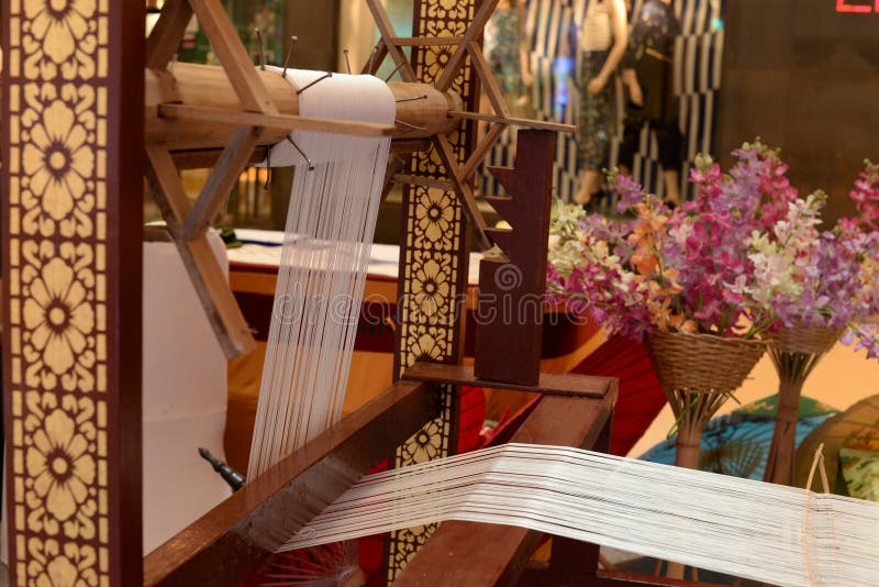 A Weaving Loom with Multiple Strands of Thread Arranged in Parallel ...