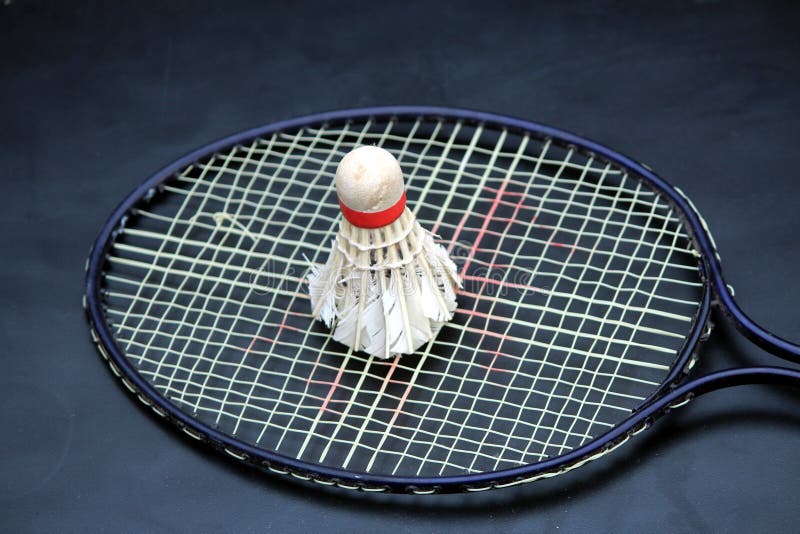 A Shuttle on a Racket with Light Black Background Stock Image - Image ...