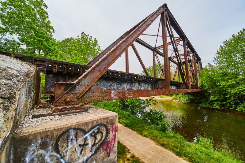 Side View of Rusty Iron Truss Train Bridge with Heart of Ohio Trail ...