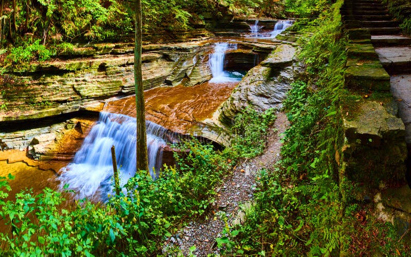 Simple Path and Stone Steps Along River with Cascading Tiers of ...