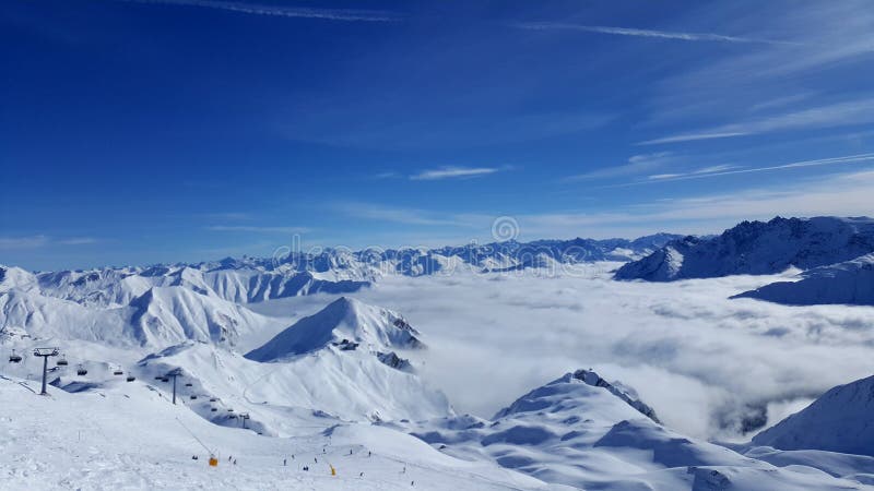 Image of Ski Resort in the Mountains with Low Stratus Over the Valleys ...
