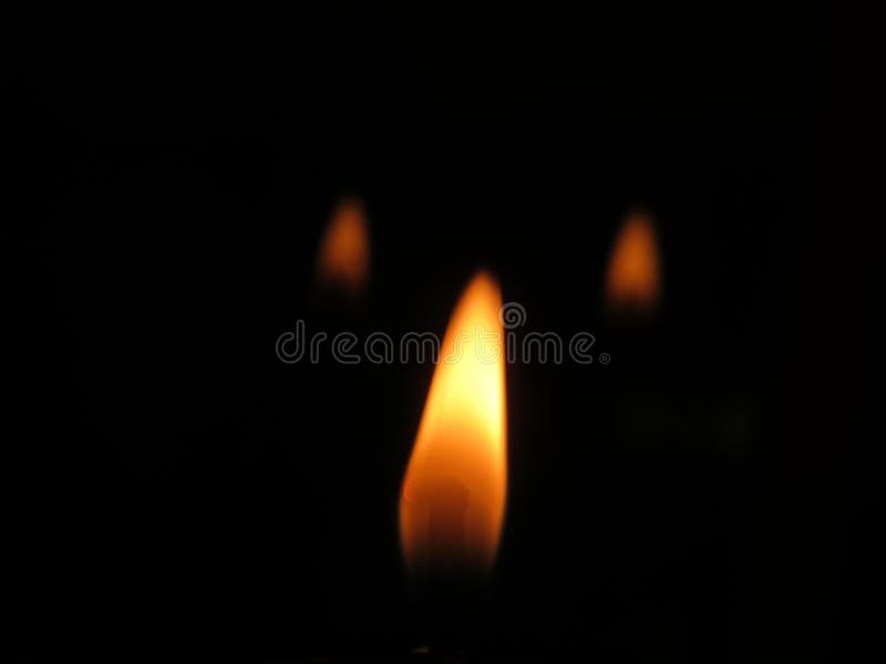 Photographic Image of Small Flames Forming a Face Stock Image - Image ...