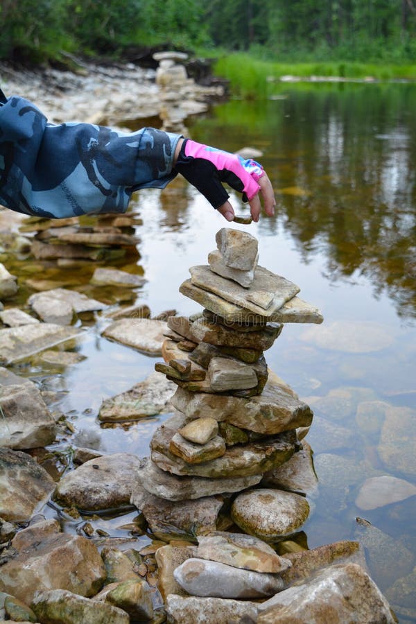 Little stone tower stock image. Image of stones, water - 148061457