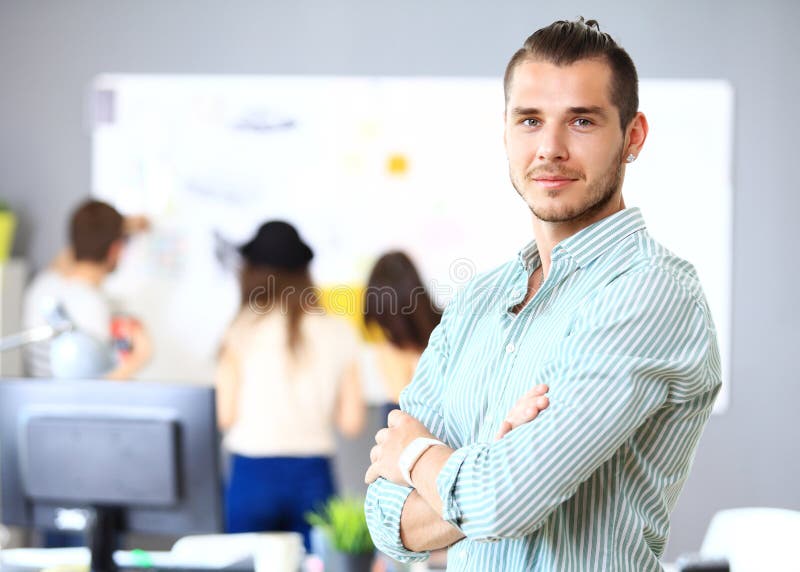 Image of Smart Young Businessmen Looking at Camera Stock Photo - Image ...